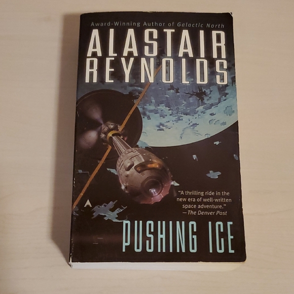 Alastair Reynolds | Accents | Pushing Ice Coffee Table Book Black Cover ...